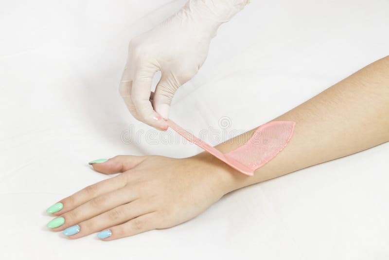 Closeup Depilation Process of Female Body Parts in Beauty Salon. Stock ...