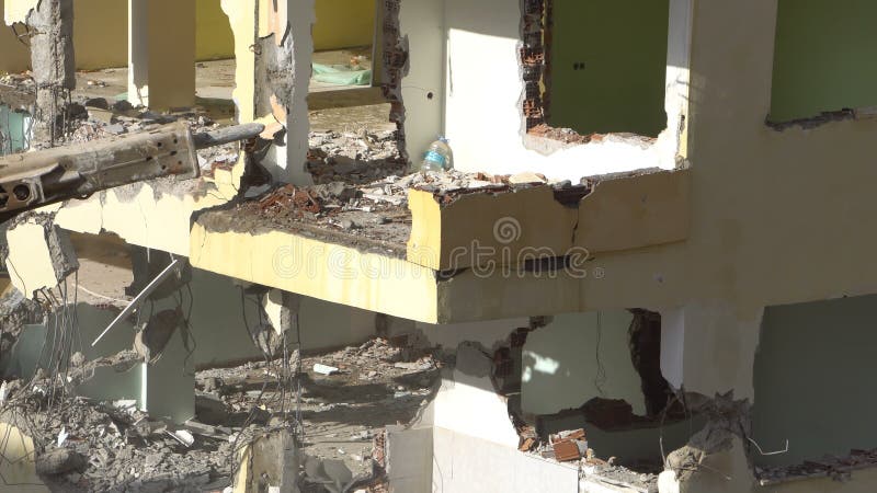 The Process of Destruction of the Old Building with Heavy Machinery ...