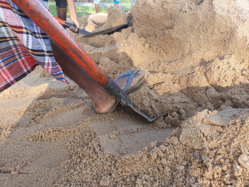 Process of Digging Sand with a Shovel on a Sunny Day Stock Image ...
