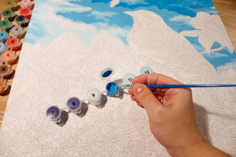 The Process of Dipping a Brush into a Jar of Acrylic Paint. Drawing a ...