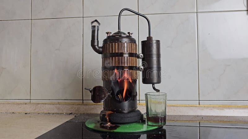 The Process of Distilling Wine at a Mini Distillery Using Wood. Volume ...