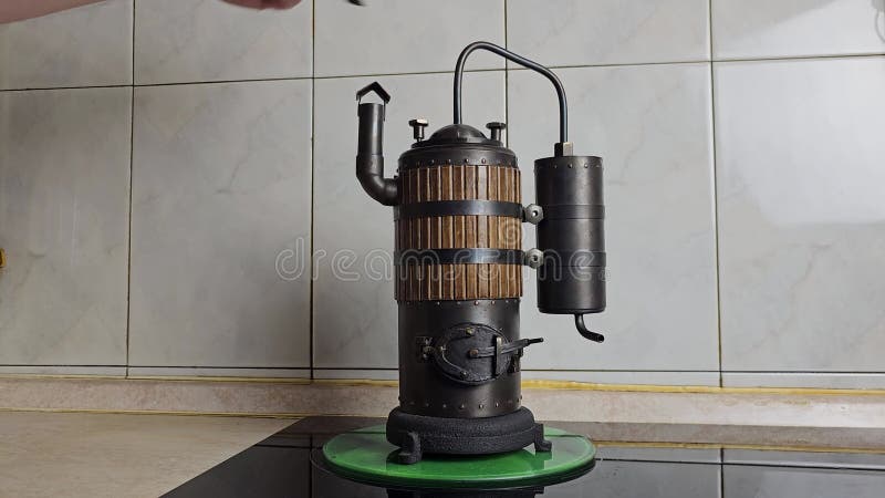 The Process of Distilling Wine at a Mini Distillery Using Wood. Volume ...