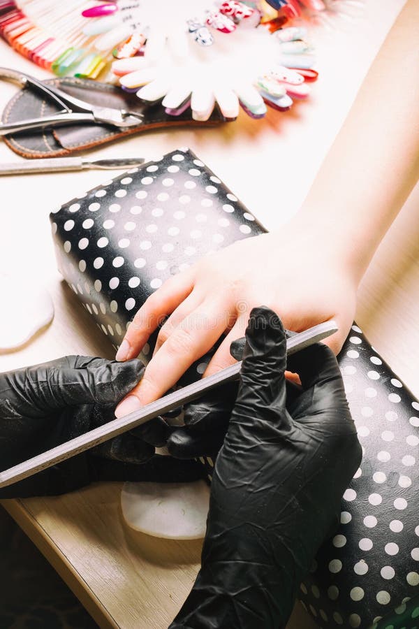Process of Doing Manicure in the Spa Salon. the Concept of Hand Care ...