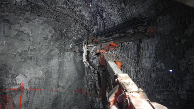 The Process of Drilling in an Underground Mine. Close-up on the ...