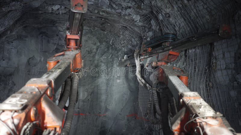 The Process of Drilling in an Underground Mine. Close-up Shows the ...