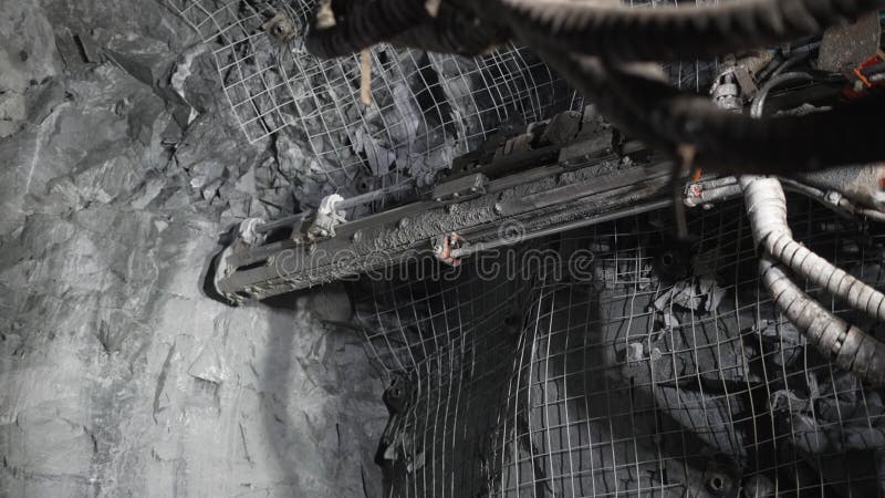 The Process of Drilling in an Underground Mine. Close-up Shows the ...