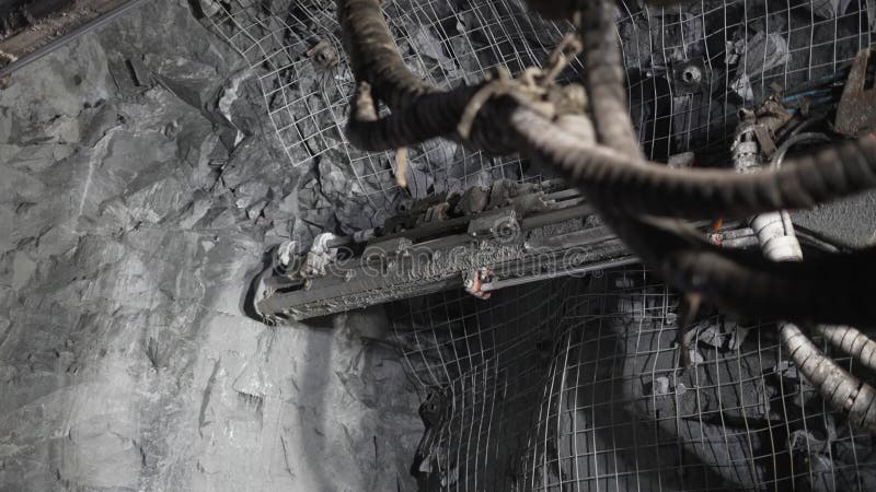 The Process of Drilling in an Underground Mine. Close-up Shows the ...