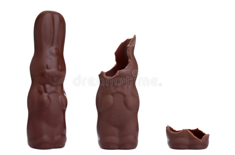 Process of Eating Delicious Chocolate Easter Bunny on White Background ...