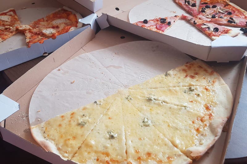 The Process of Eating Pizza, Leftover Pizza in a Portable Box Stock ...