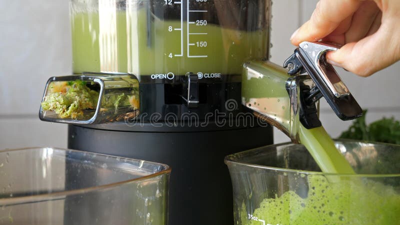 Process of Extracting Fresh Juice from Apple and Mint Stock Photo ...