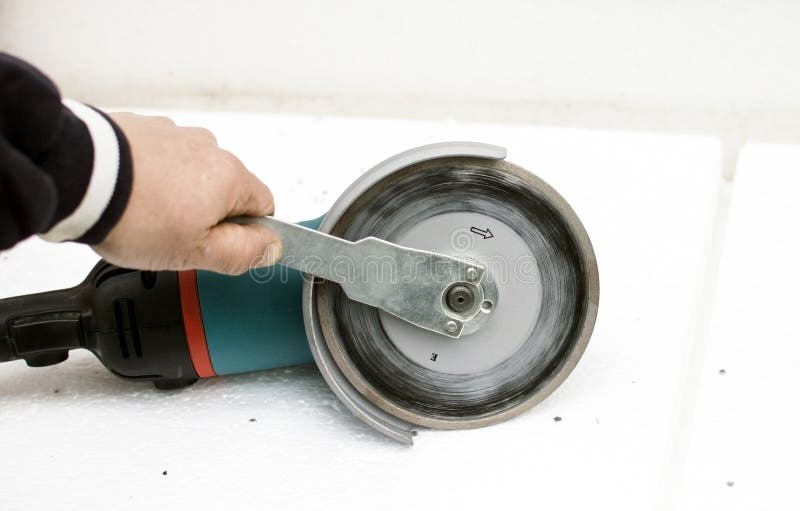 The Process of Fixing Disk for Cutting on Angle Grinders Stock Image ...