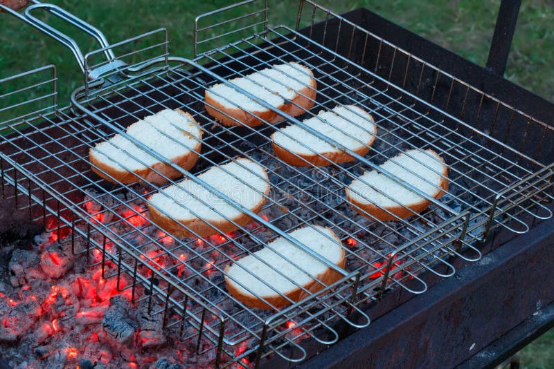 The Process of Frying the Bread Slices Stock Photo - Image of mesh ...