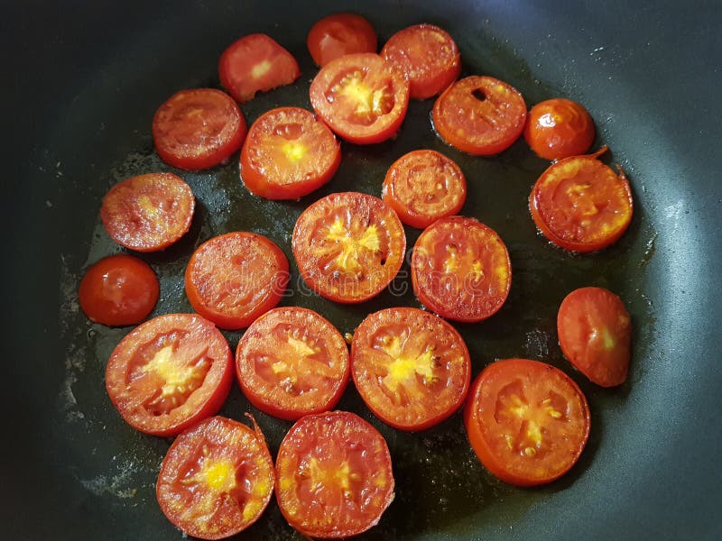 The Process of Frying Tomato Slices in a Pan Stock Image - Image of ...