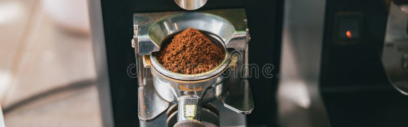 Process of Grinding Coffee Beans Pouring into a Portafilter Using ...