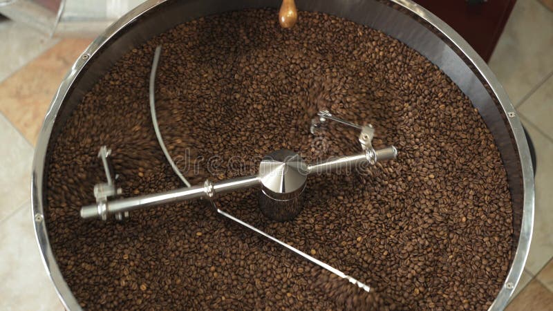 Process of Grinding Roasted Coffee Beans in Machine. 4K Stock Photo ...