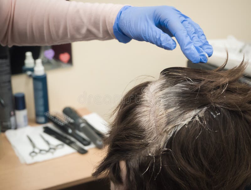 The Process of Hair Coloring with Beauty Salon. Close Up. Stock Photo ...