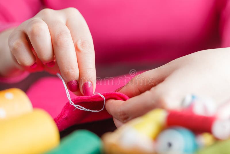 Process of Hand Made Soft Toys Sewing with Felt and Needle Stock Image ...
