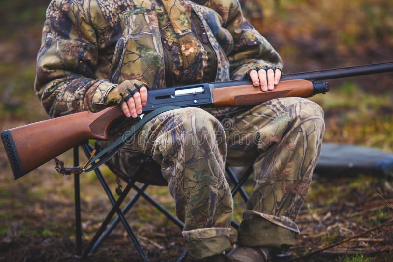 Group Of Men Hunters Going Up On Rural Road During Hunting Season Stock ...
