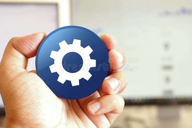 Process Icon Blue Round Button Holding by Hand Infront of Workspace ...