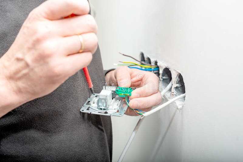 The Process of Installing an Internal Socket for Internet Access Stock ...