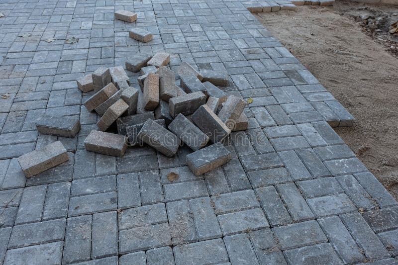 Process of Installing Paving Bricks in the Town Pedestrian Zone. Laying ...