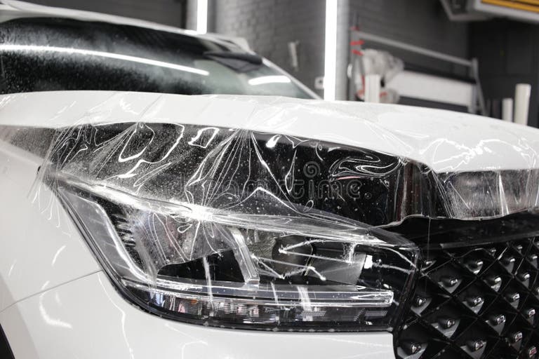 The Process of Installing PPF on the Hood of the Car. Anti-gravity ...