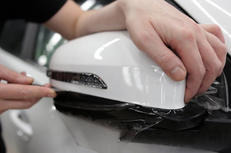 The Process of Installing PPF on the Hood of the Car. Anti-gravity ...
