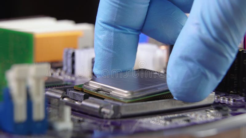 The Process of Installing a Processor on a Computer Motherboard Stock ...