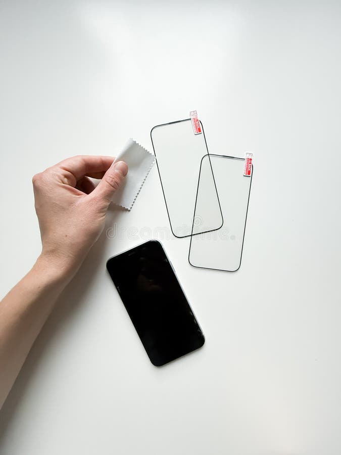 Process of Installing Protective Glass on the Phone Stock Image - Image ...