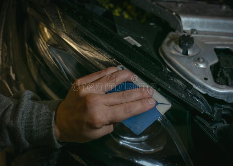 The Process of Installing a Protective Polyurethane Film for Paint on ...