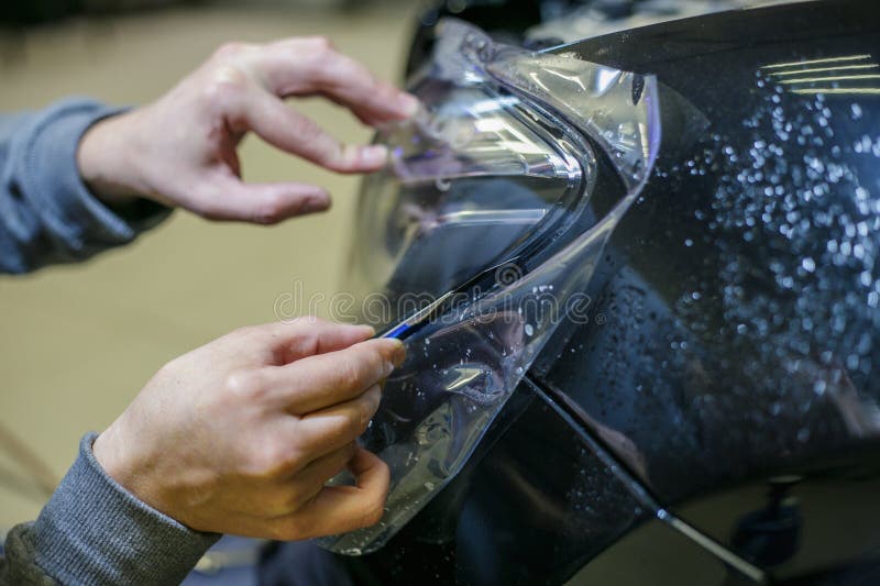 The Process of Installing a Protective Polyurethane Film for Paint on ...