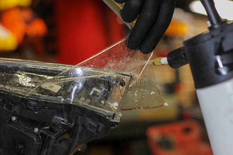 The Process of Installing a Protective Polyurethane Film for Paint on ...