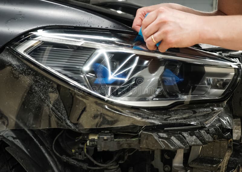 The Process of Installing a Protective Polyurethane Film for Paint on ...