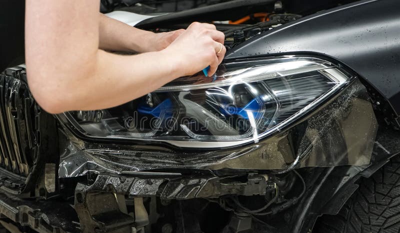 The Process of Installing a Protective Polyurethane Film for Paint on ...