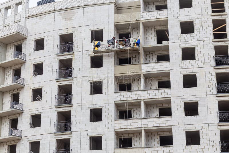 The Process of Insulating External Walls in a Multi-storey Building ...
