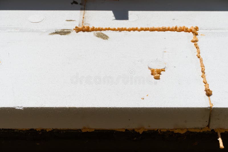 The Process of Insulating a House with Polystyrene Foam Insulation. a ...