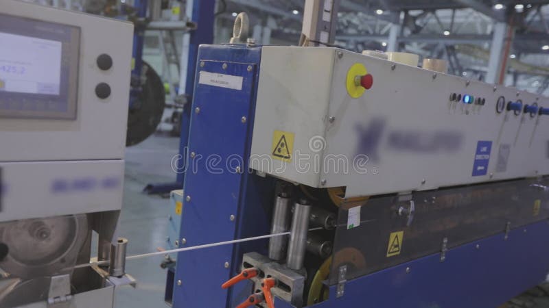 The Process of Insulation in a Modern Factory. Modern Unit for ...