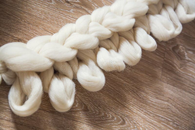 The Process of Knitting a Plaid of Large Knitting from Merino Wool ...