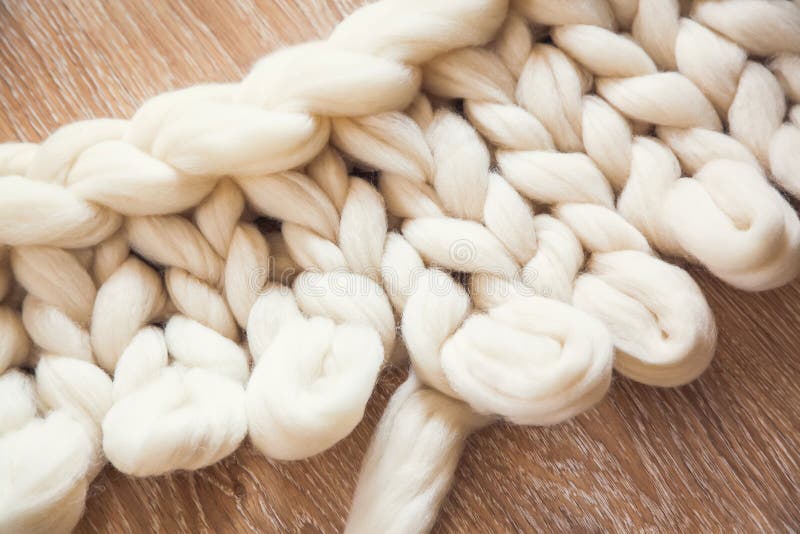 The Process of Knitting a Plaid of Large Knitting from Merino Wool ...