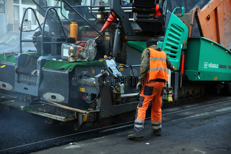 Process of Laying Asphalt Pavement on the Road. Moscow. 08.09.2018 ...