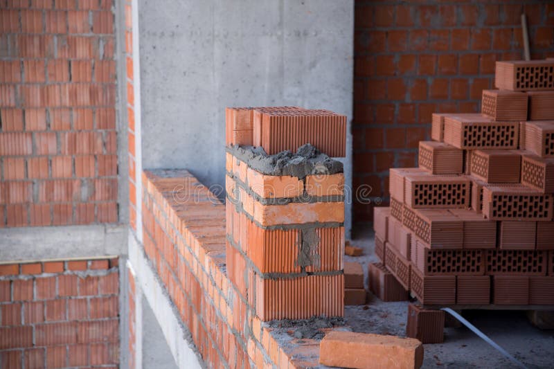 The Process of Laying Bricks on Construction Site Stock Photo - Image ...