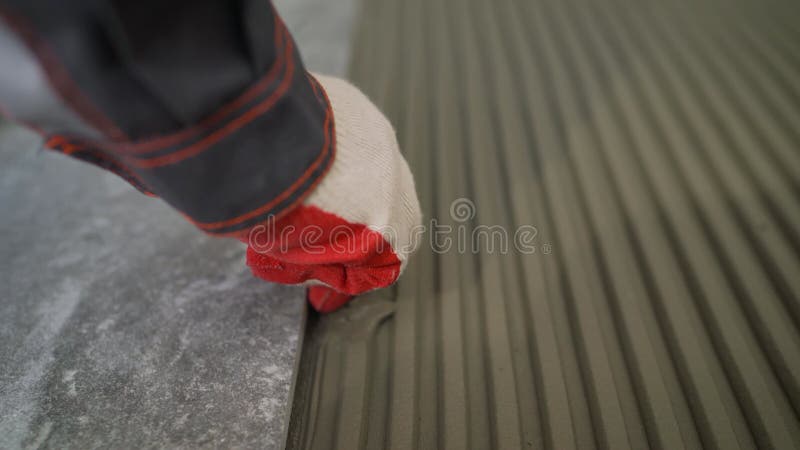 The Process of Laying Ceramic Floor Tiles. Large Format Ceramic Tiles ...