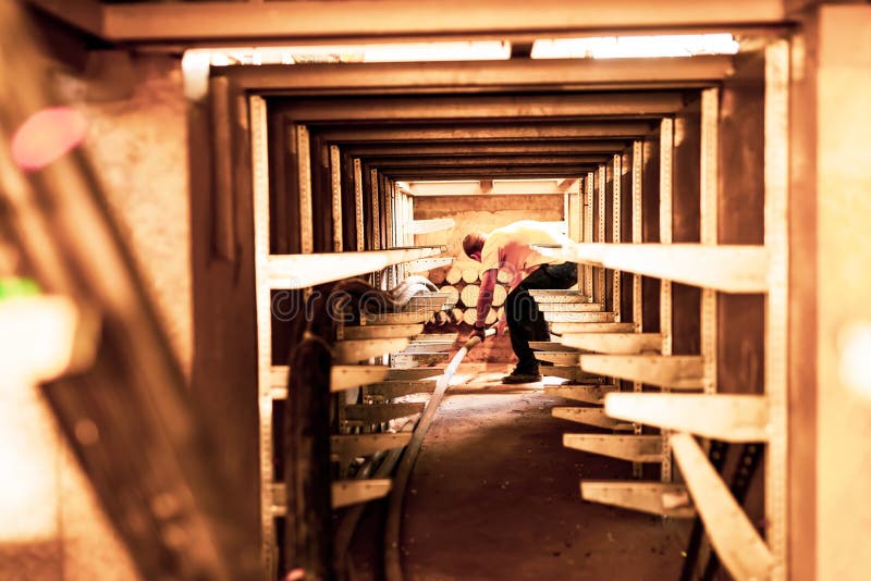 The Process of Laying a High-voltage Cable in a Cable Tunnel Stock ...