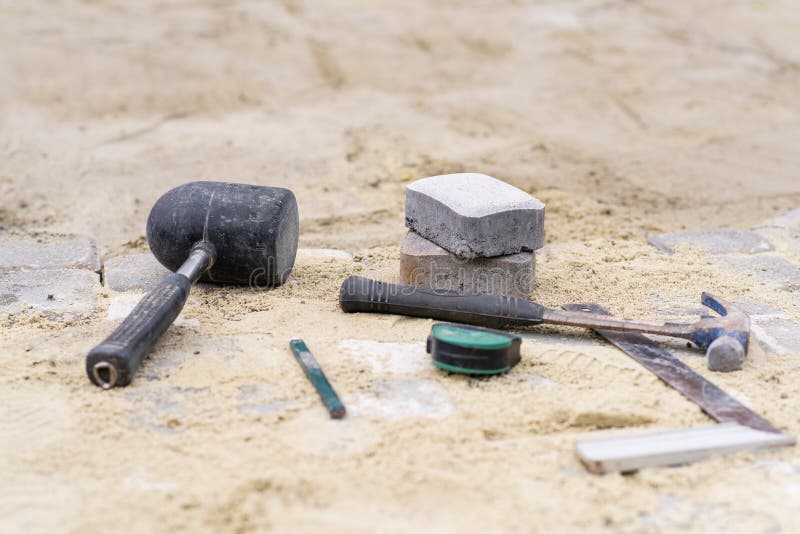 Process of Laying Pavement at Yard. Stones are Laying on Sand. Work ...