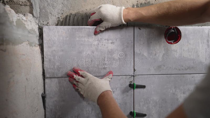 The Process of Laying Tiles. Construction, Renovation, Apartment ...