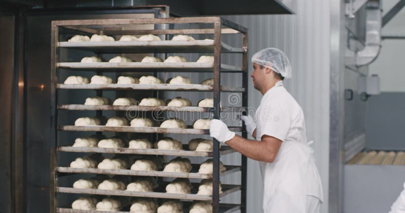 Process of Loading the Baking Bread into the Industrial Oven , Bakery ...