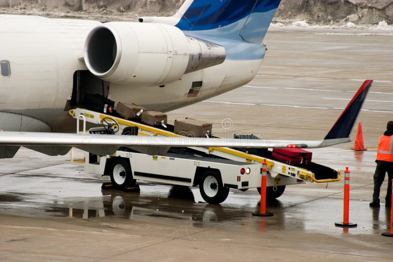 Process of Loading Luggage in a Jet during Daytime Stock Image - Image ...