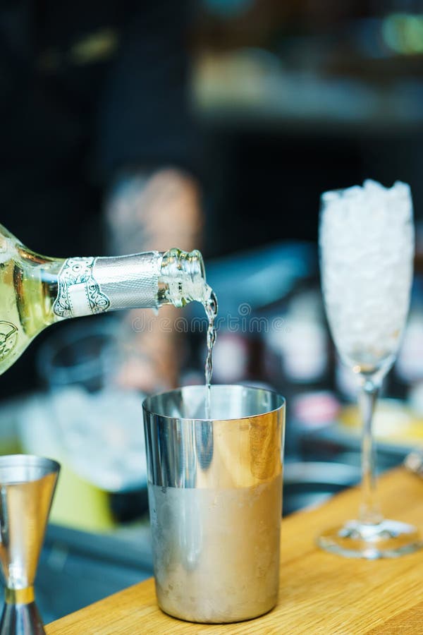 Process of Making an Alcoholic Cocktail by the Bartender at the Bar ...