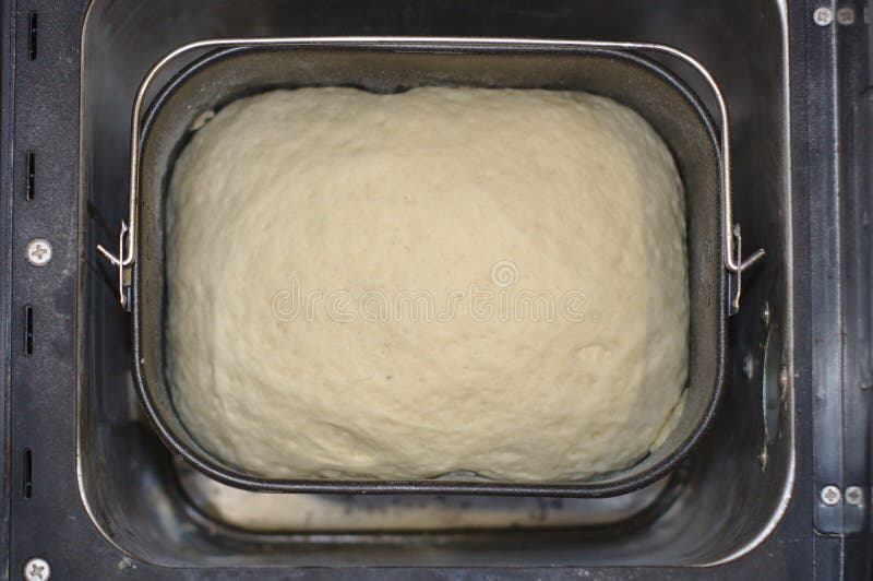 The Process of Making Bread at Home. Dough in Bread Maker Stock Photo ...