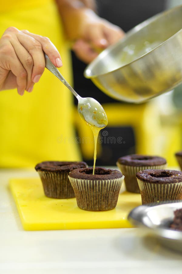 The Process of Making Chocolate Cupcakes with Sweet Cream. Creation of ...